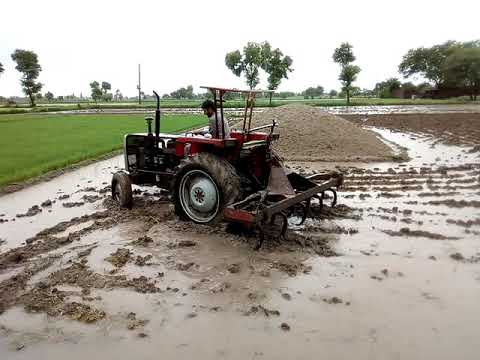 Driving a Tractor In the Rain Tractor Ranch Company Phoenix, AZ (602 ...